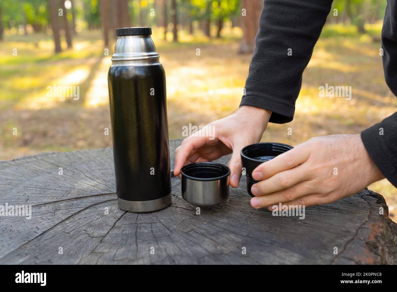 Black travel mug placed hi-res stock photography and images - Alamy