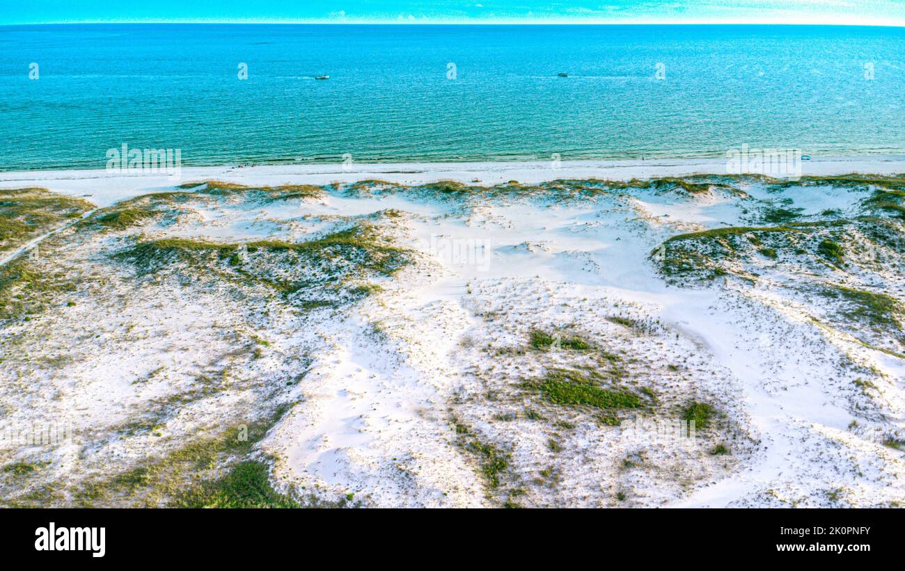 A beautiful view of snowy beach and ocean Stock Photo - Alamy