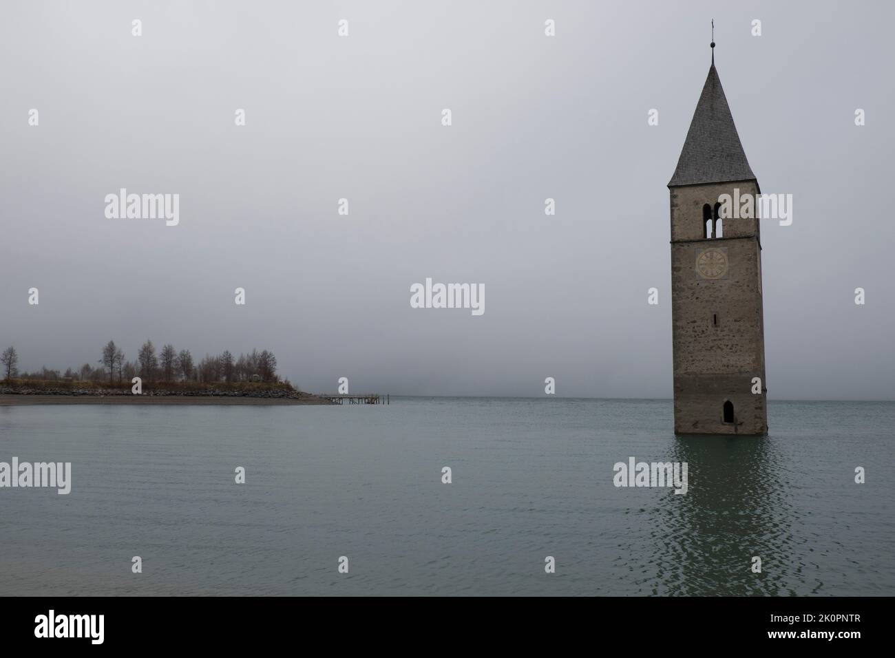 Steeple submerged church Curon Stock Photo - Alamy