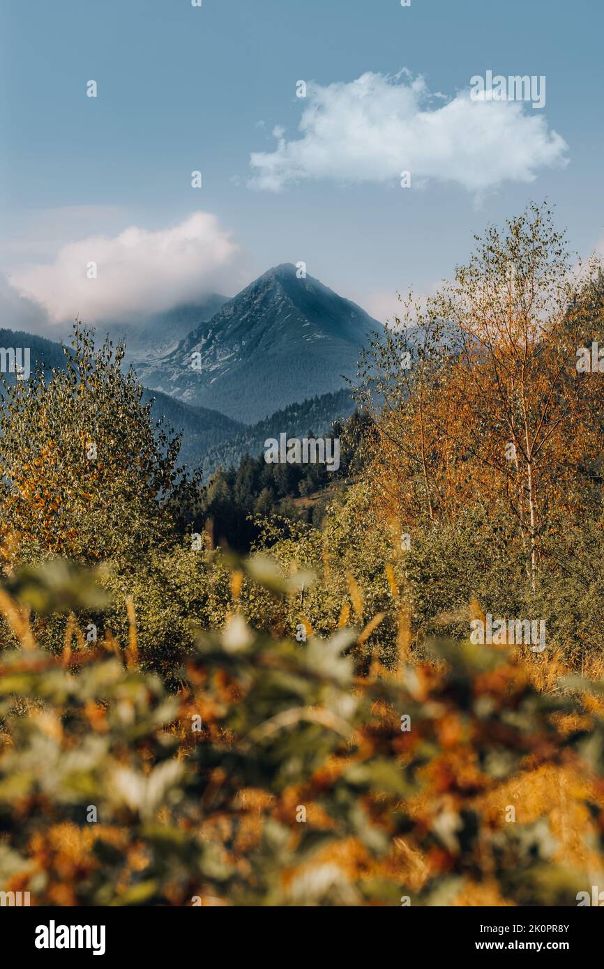 Mountainous countryside scenery at sunset. Dramatic sky above the ...