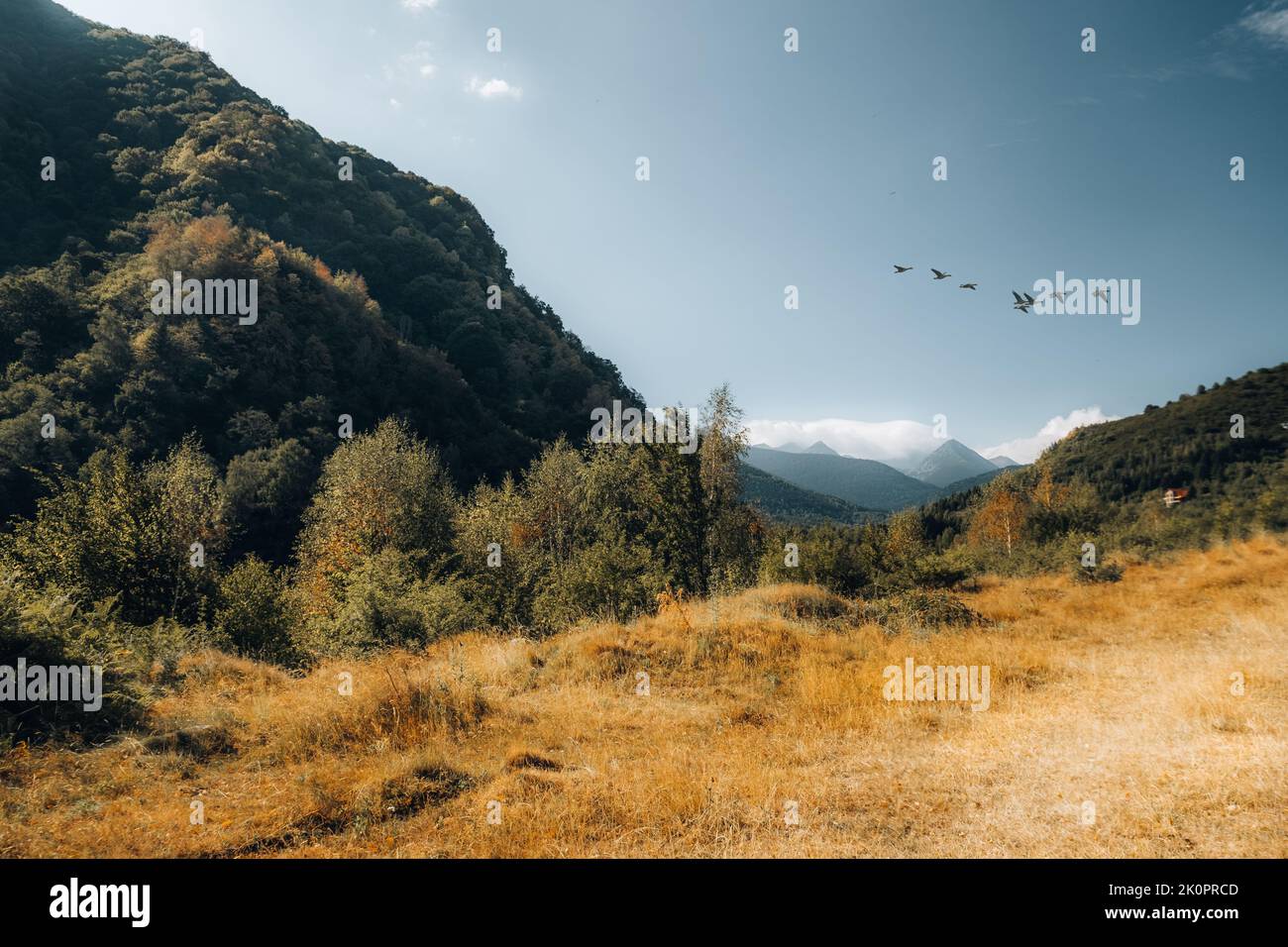Mountainous countryside scenery at sunset. Dramatic sky above the ...