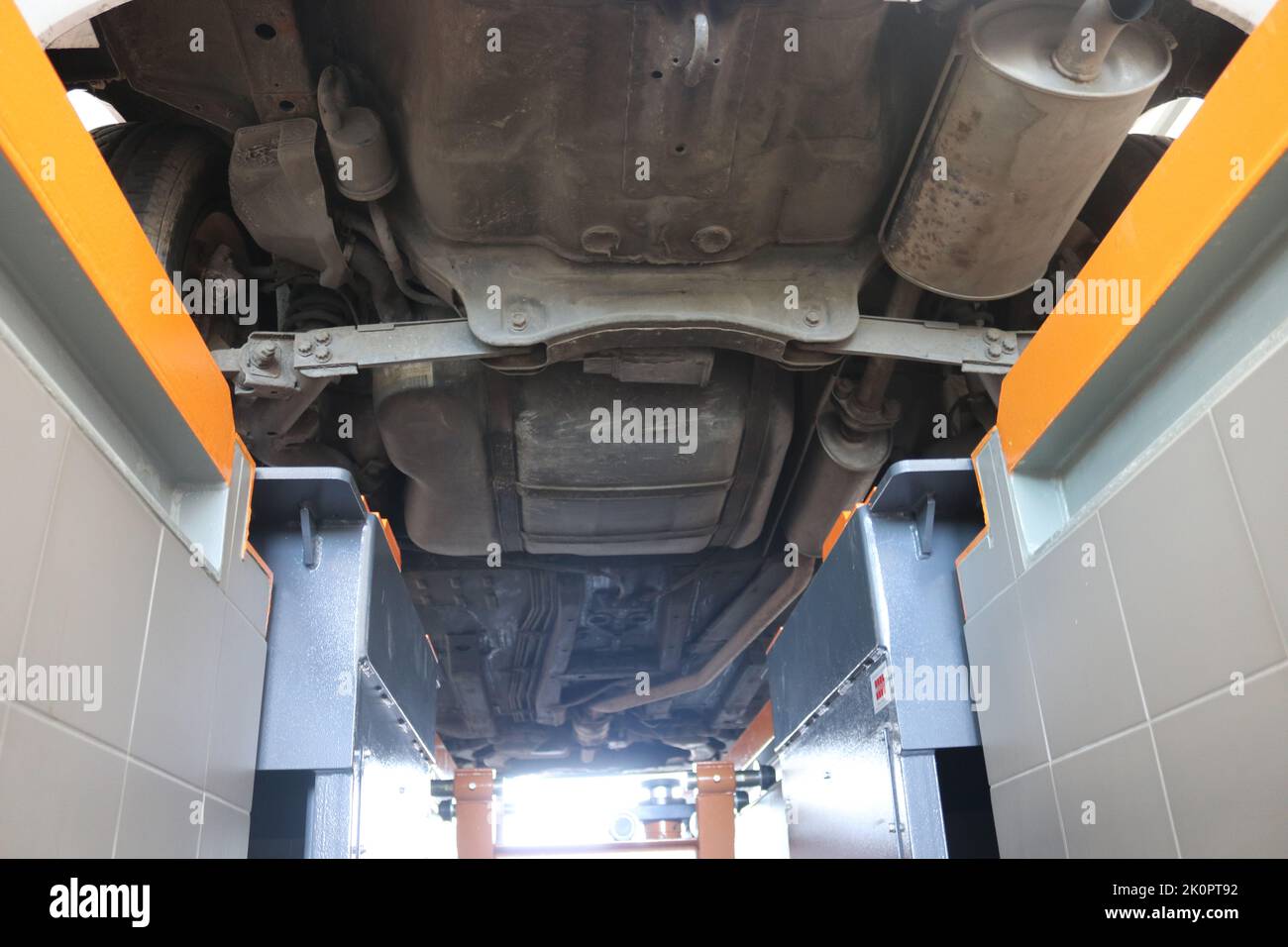 Car in the mechanic. View from the pit, car vehicle inspection Stock ...