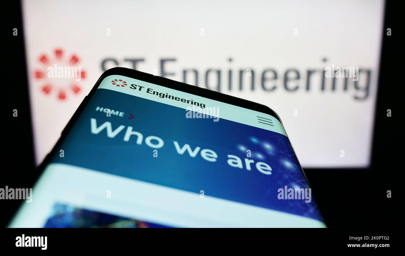 Mobile phone with webpage of Singapore Technologies Engineering Ltd ...