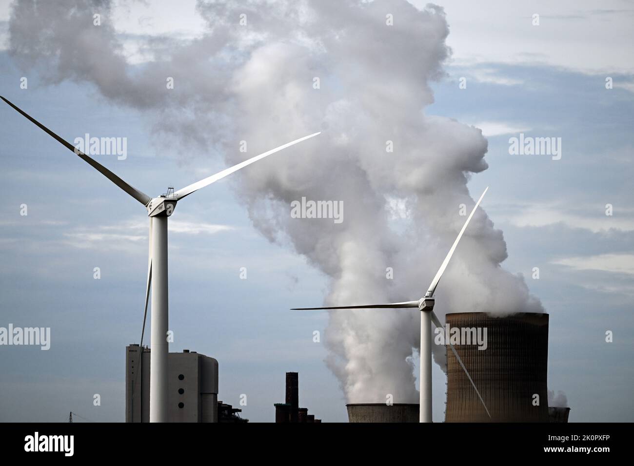 Niederaussem, Germany. 13th Sep, 2022. Wind turbines stand in front of ...