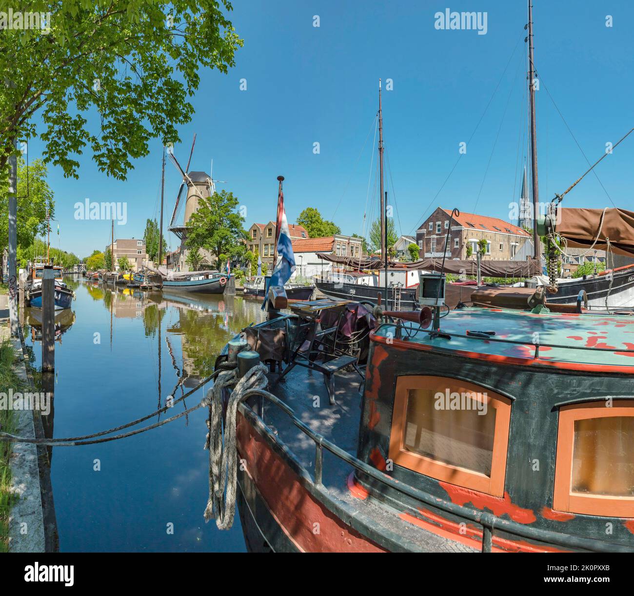 Ancient ships at the Museum-port, windmill called De Roode Leeuw, Gouda ...