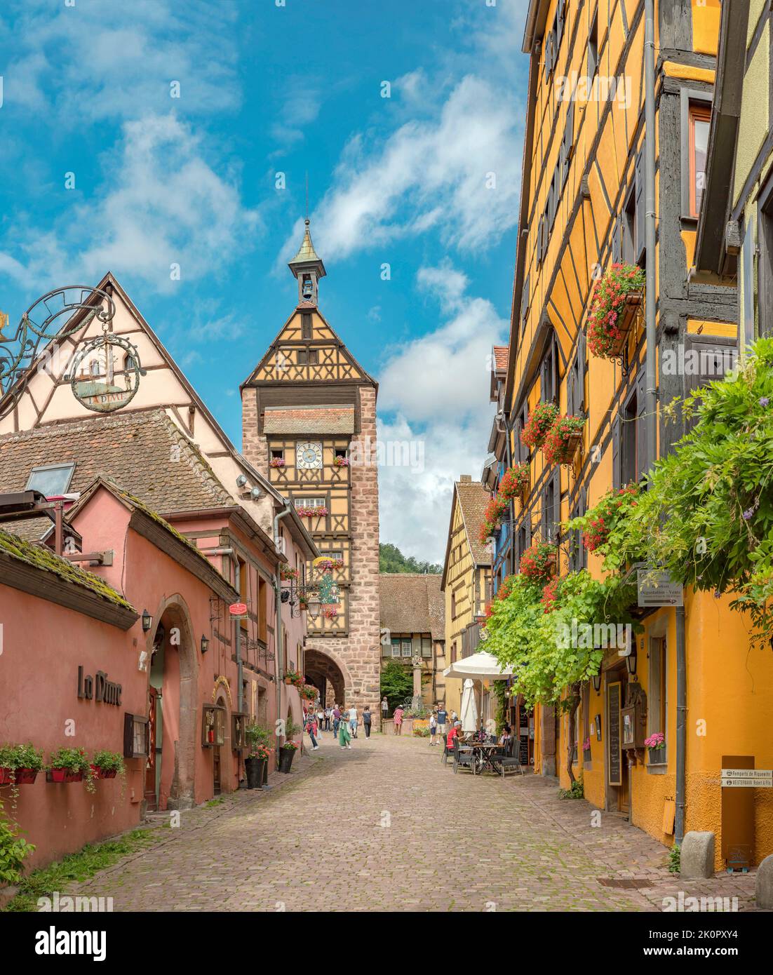 Half-timbered houses and the tower of the Musée du Dolder, Riquewihr ...