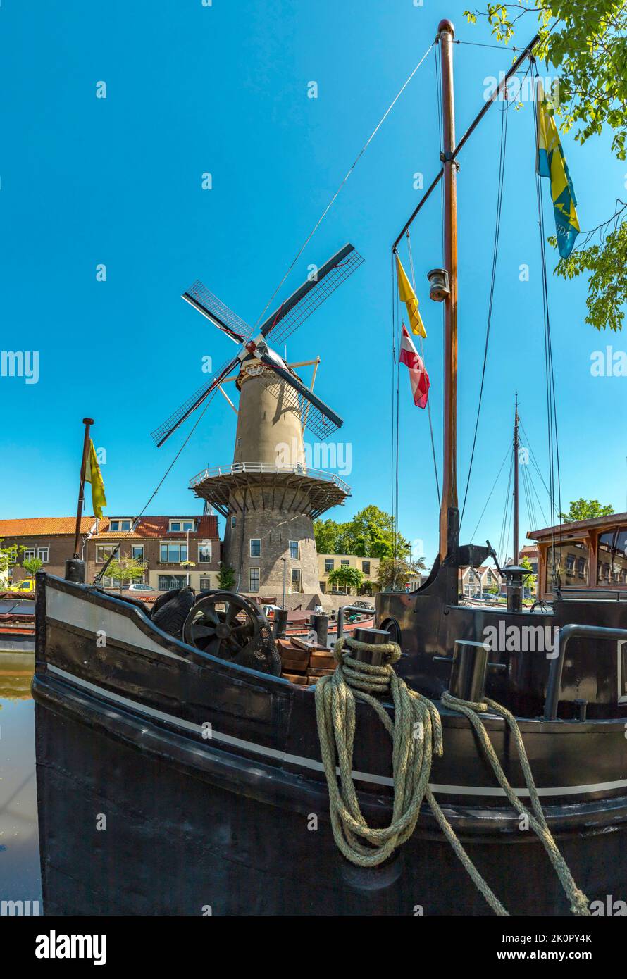 Ancient ships at the Museum-port, windmill called De Roode Leeuw, Gouda ...