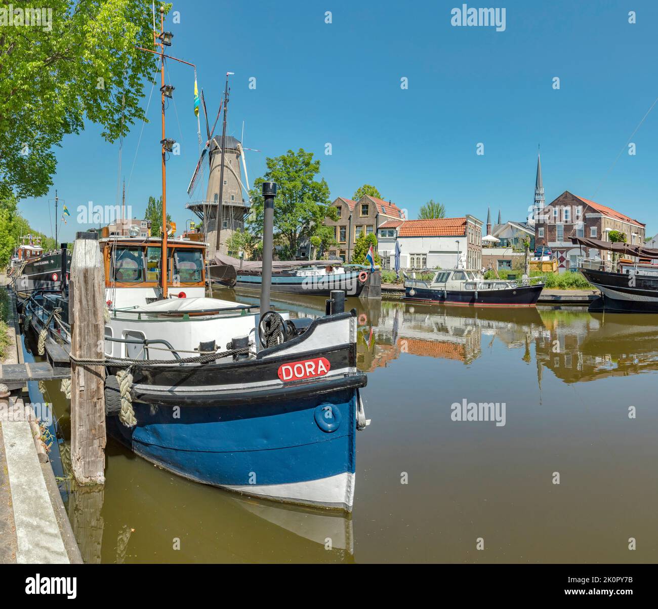 Ancient ships at the Museum-port, windmill called De Roode Leeuw, Gouda ...