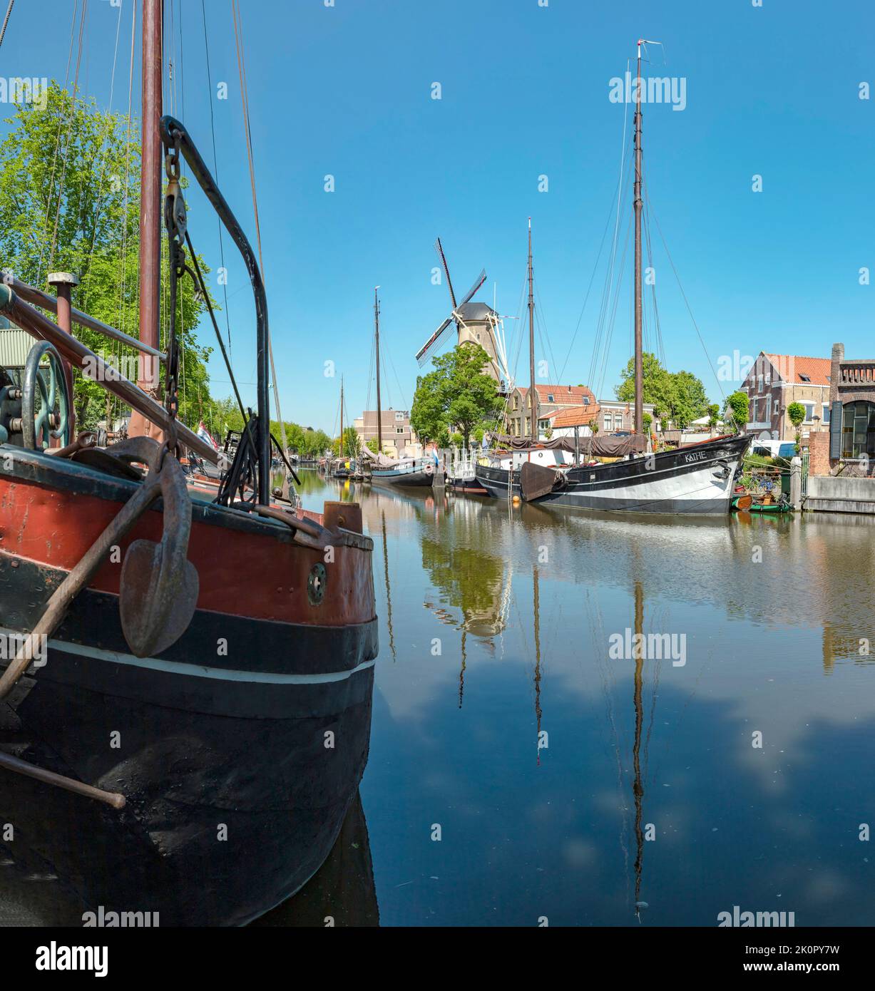 Ancient sailingships at the Museum-port, windmill called De Roode Leeuw ...