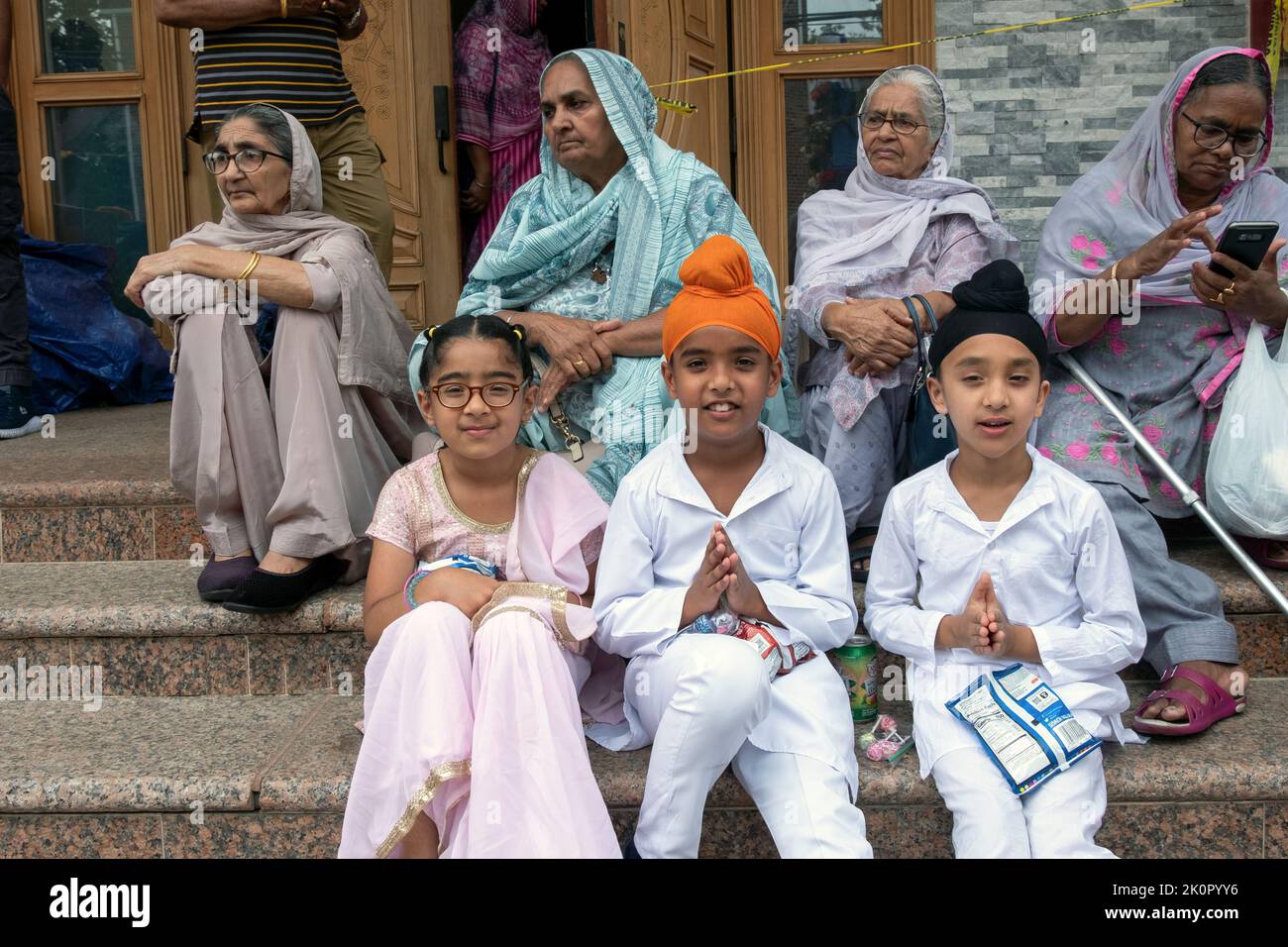 On the steps of the Sikh Cultural Center, children and women senior ...