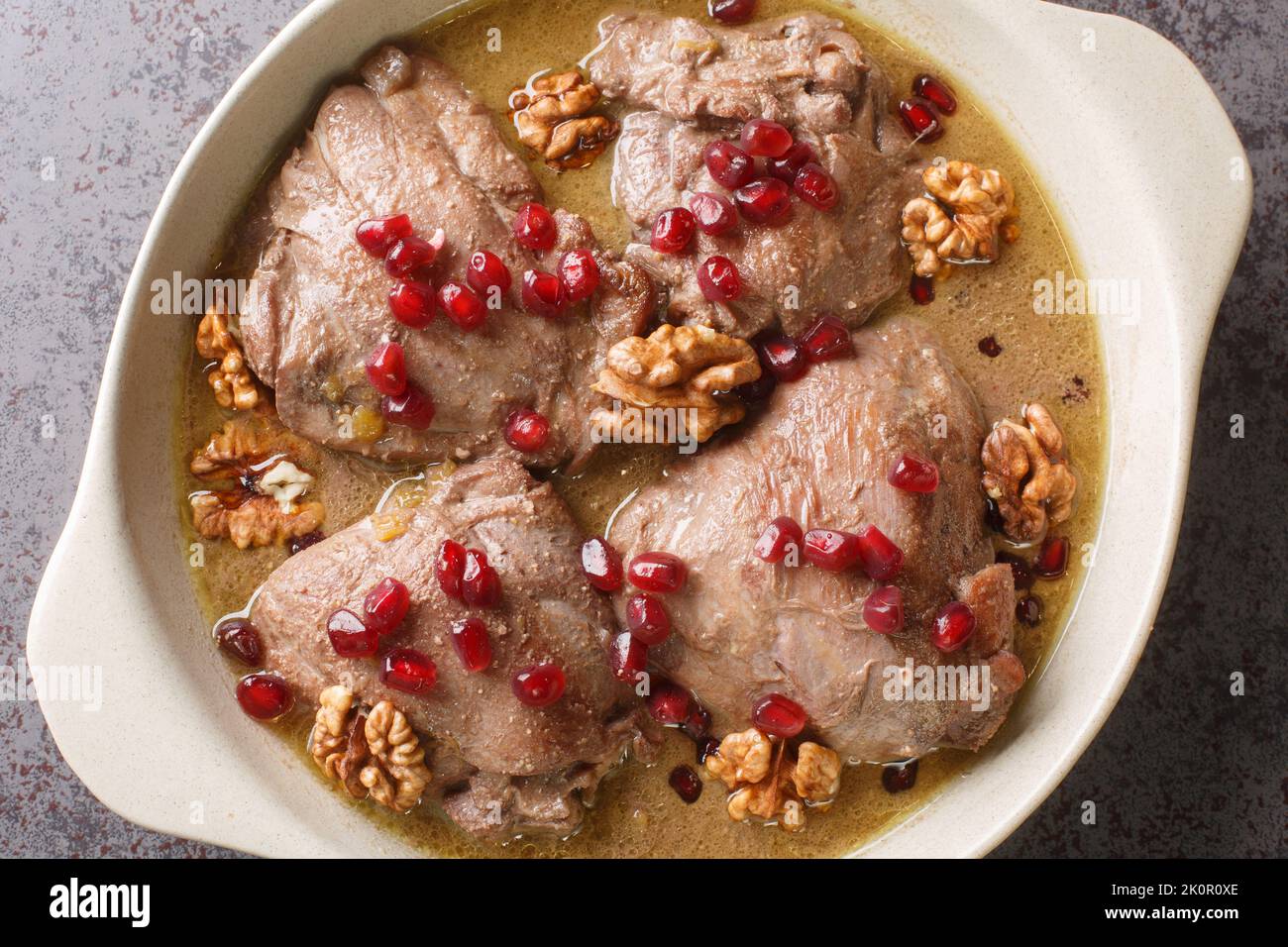 Fesenjan is a simple slowly cooked Iranian stew featuring ground ...