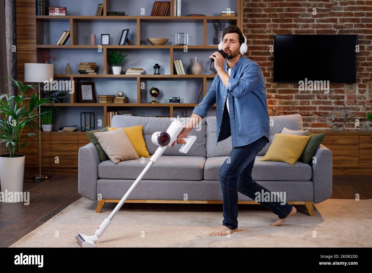 Cleaning house man cleans floor hi-res stock photography and images - Alamy