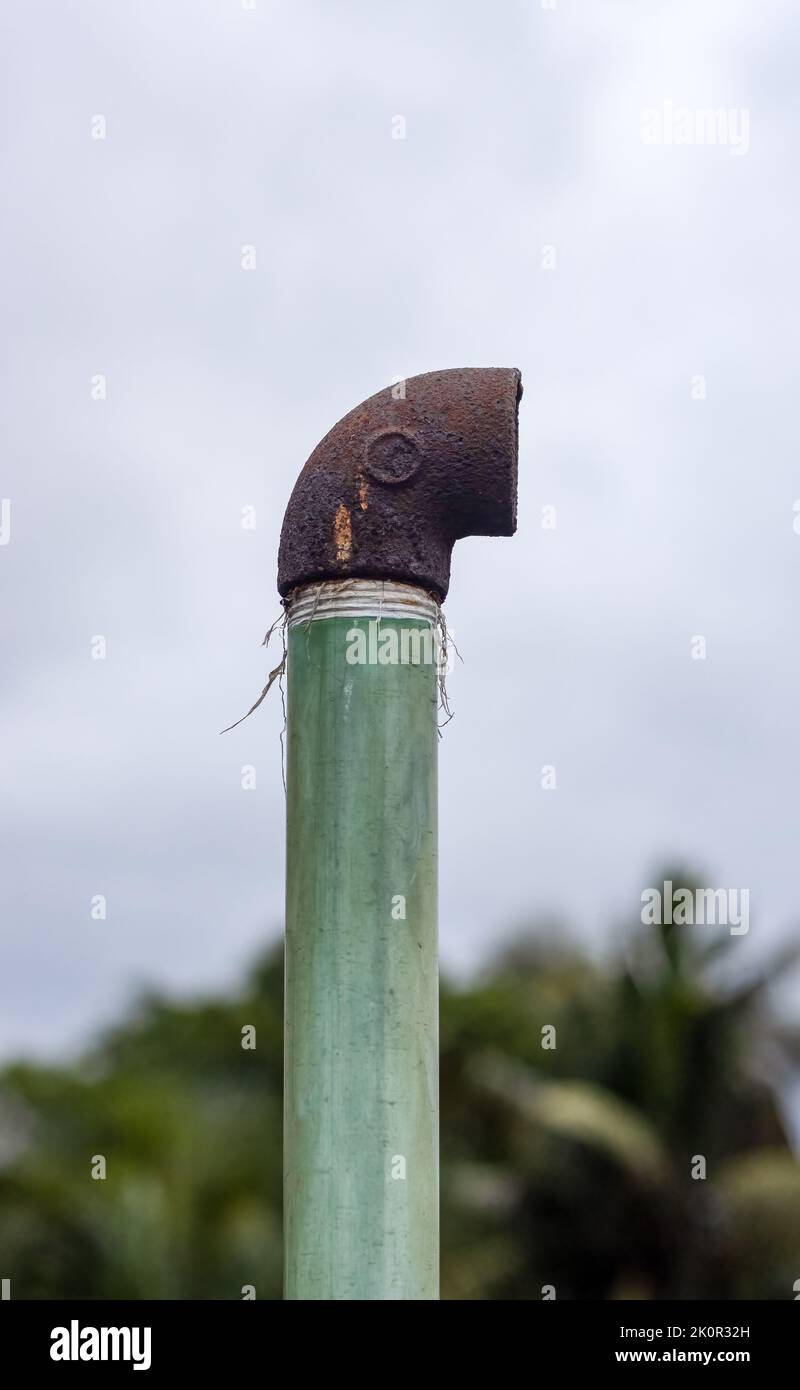 Outdoor exhaust pipe of old water line close up Stock Photo - Alamy
