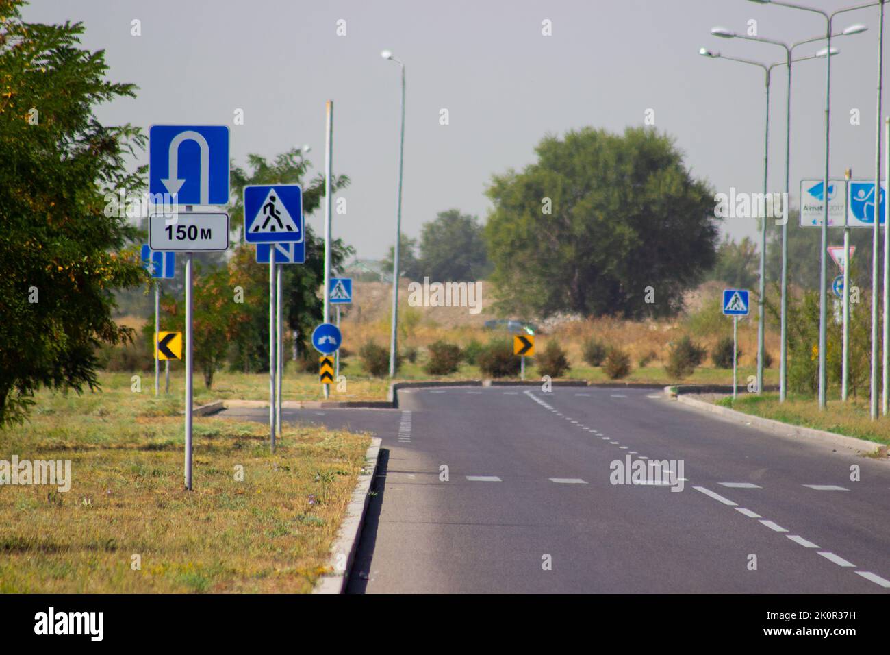 traffic direction sign white reverse arrow on blue background Stock ...