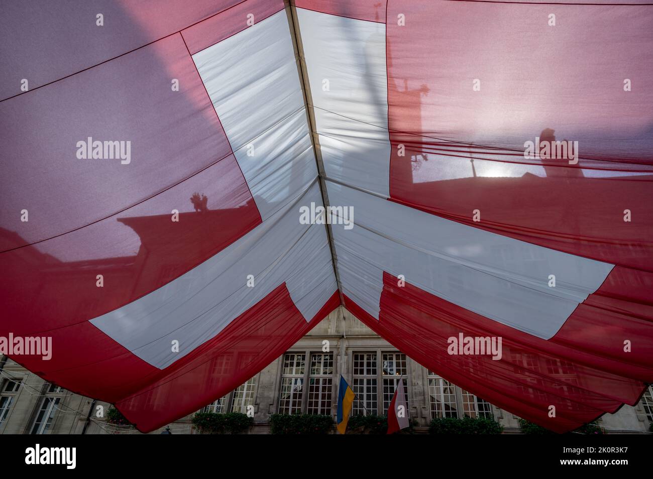 Lausanne town hall with Swiss flag and Ukraine flag. Lausanne, Vaud ...
