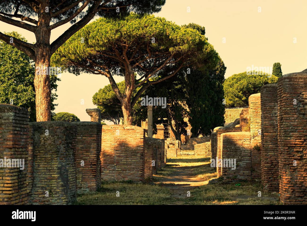 Sunset street view at archaeological Roman ruins in Ostia antica , a ...