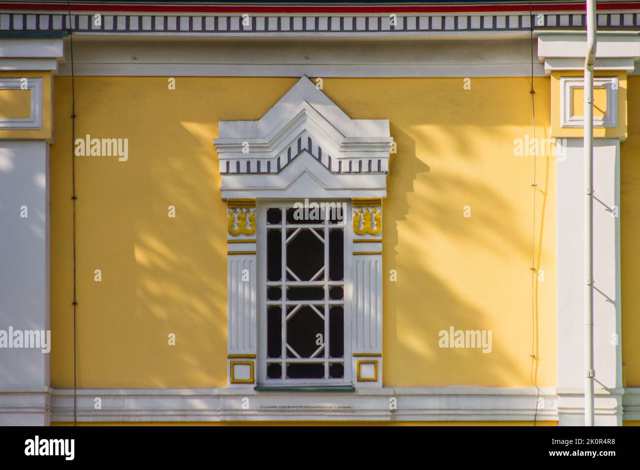 Ascension Cathedral wooden window frame on yellow wall, Russian ...