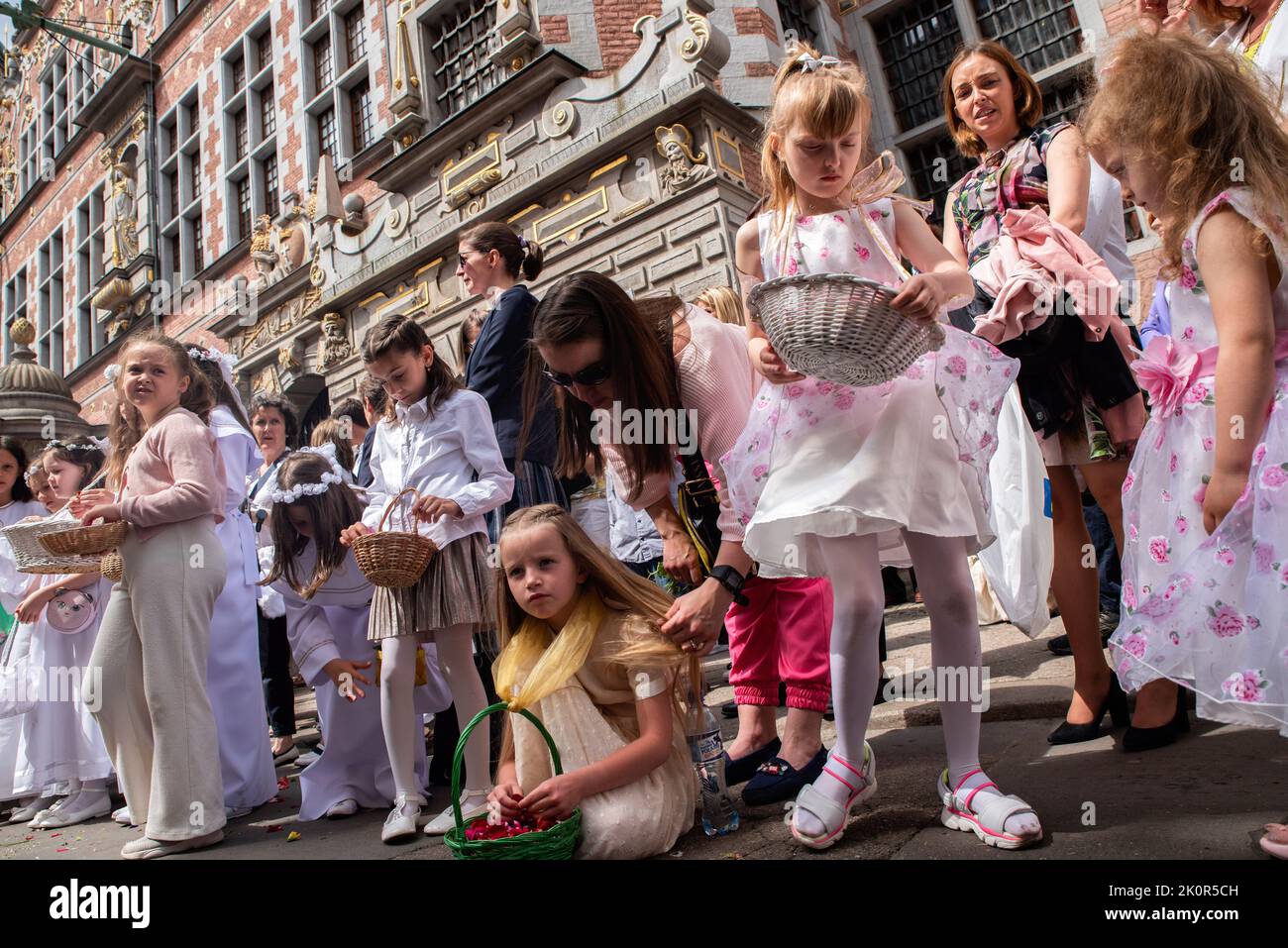 Kids seen dressed in white dresses during the procession. Corpus ...