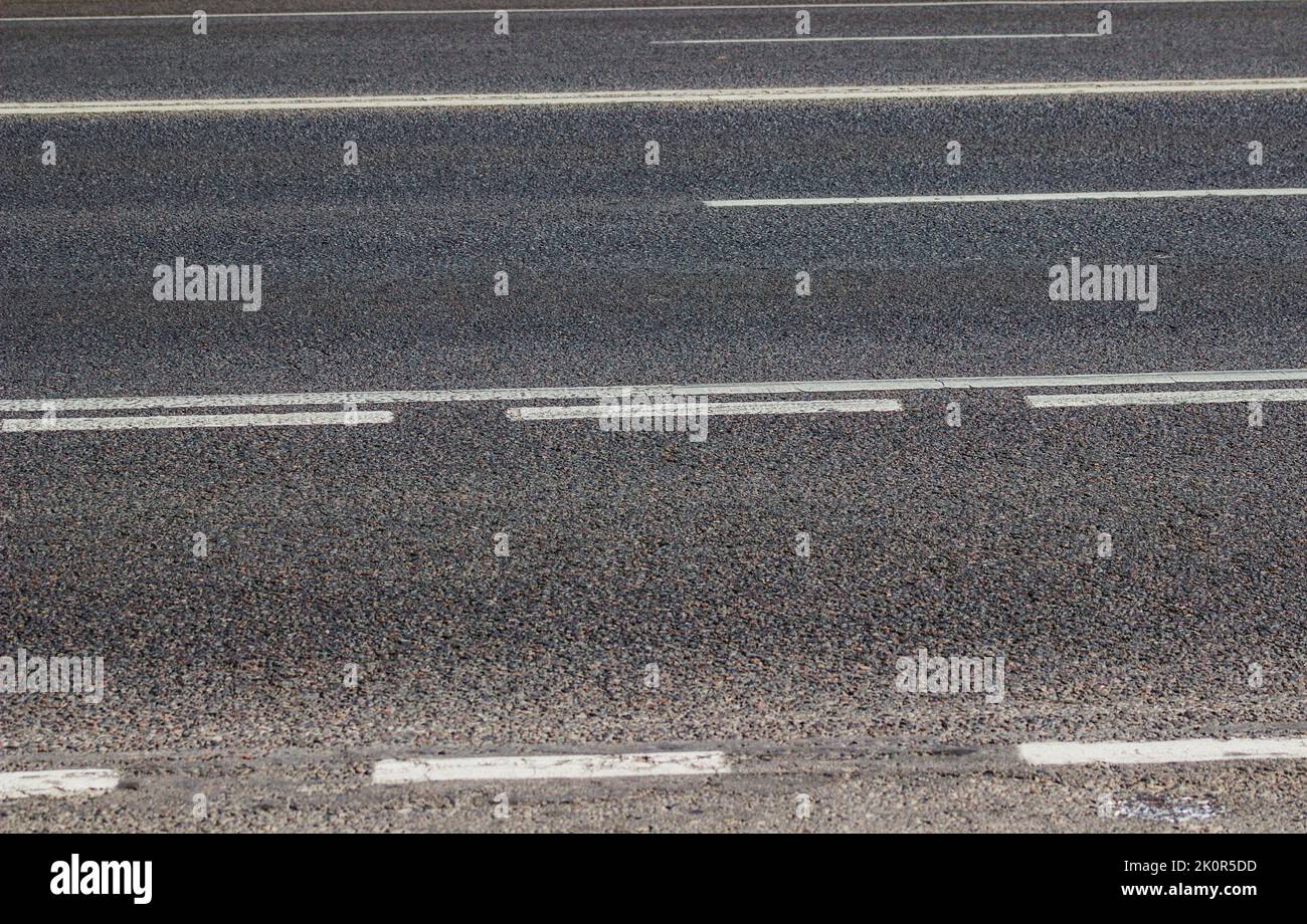 Asphalt road texture grey background Stock Photo - Alamy
