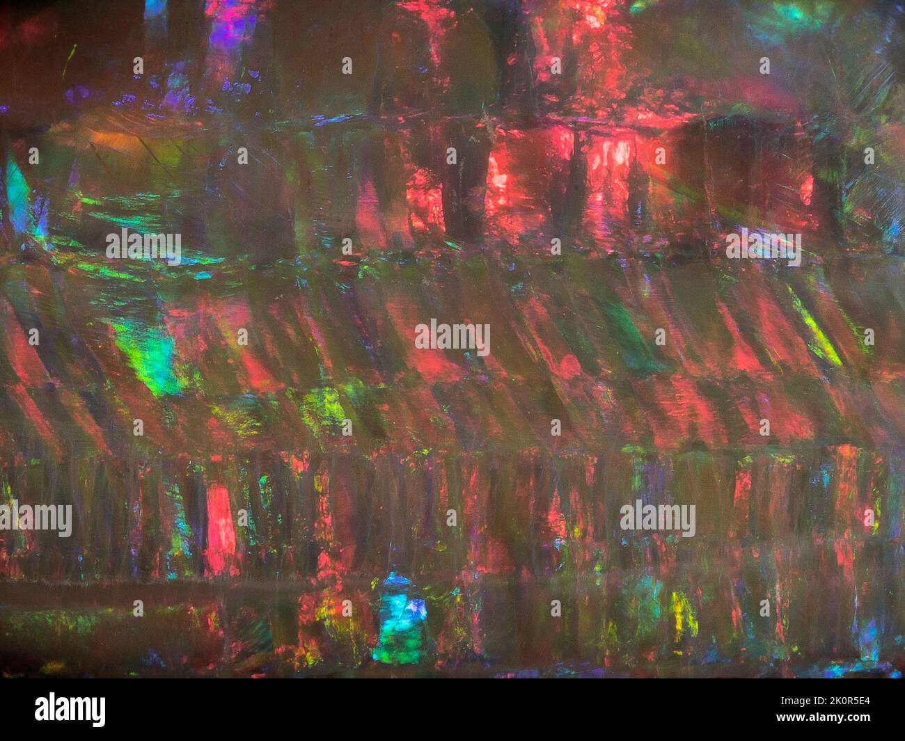 Australian Opal gemstones, shot on a black background to highlight the ...