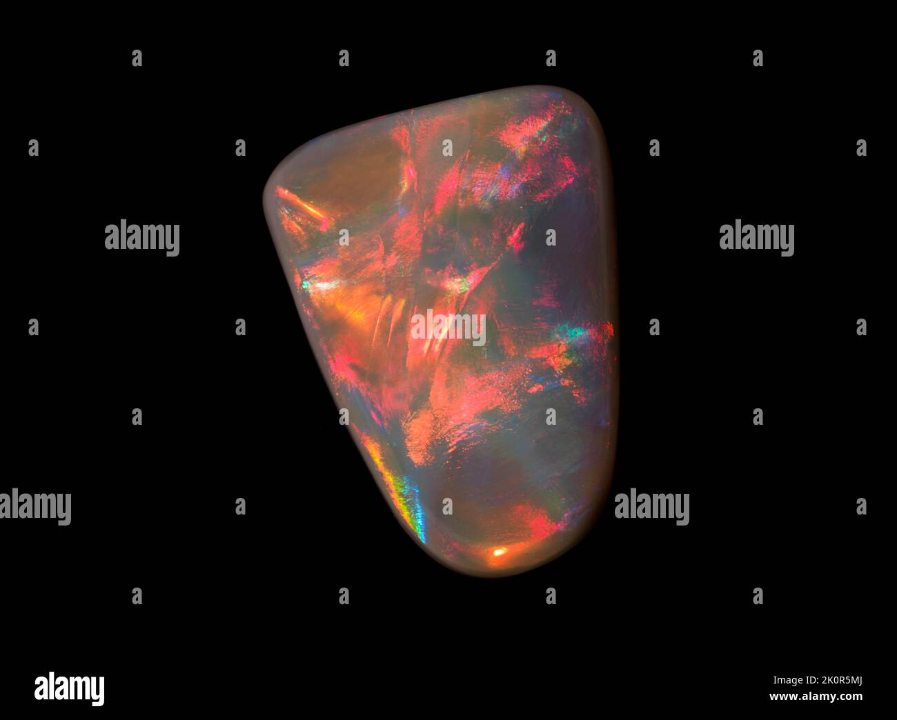 Australian Opal gemstones, shot on a black background to highlight the ...