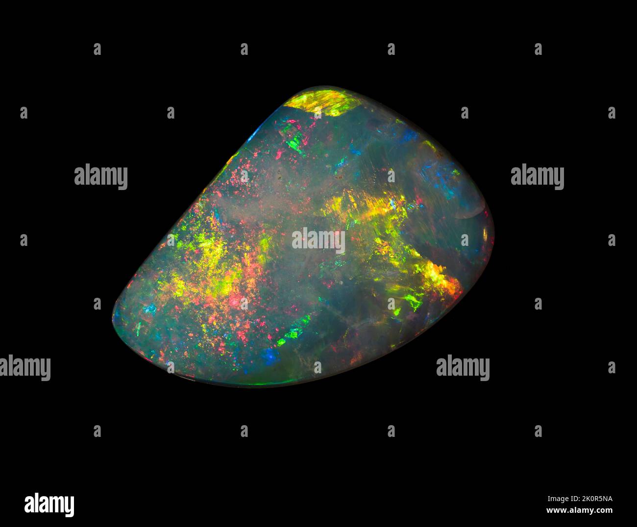 Australian Opal gemstones, shot on a black background to highlight the ...