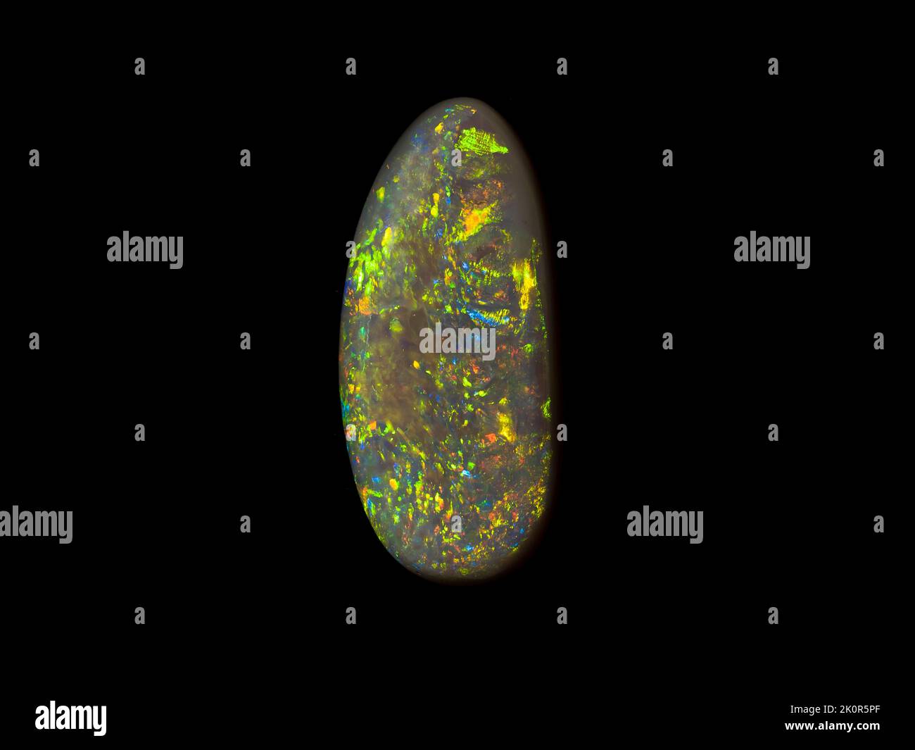 Australian Opal gemstones, shot on a black background to highlight the ...