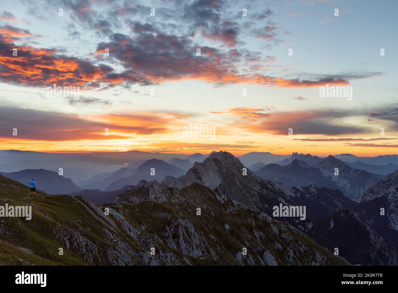 An aerial view of the beautiful Karavanke mountain chain at sunset in ...