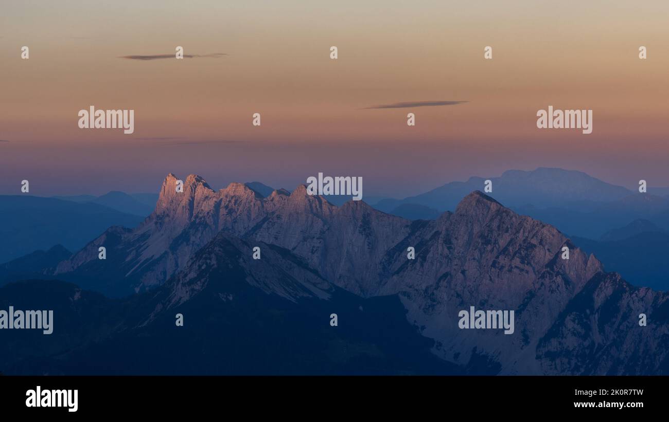 An aerial view of the beautiful Karavanke mountain chain at sunset in ...