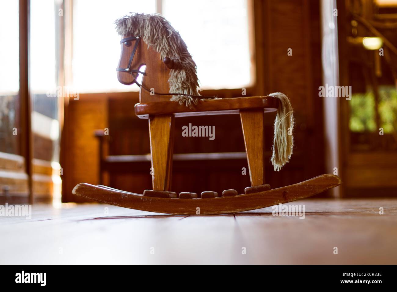 A wooden rocking horse chair Stock Photo - Alamy