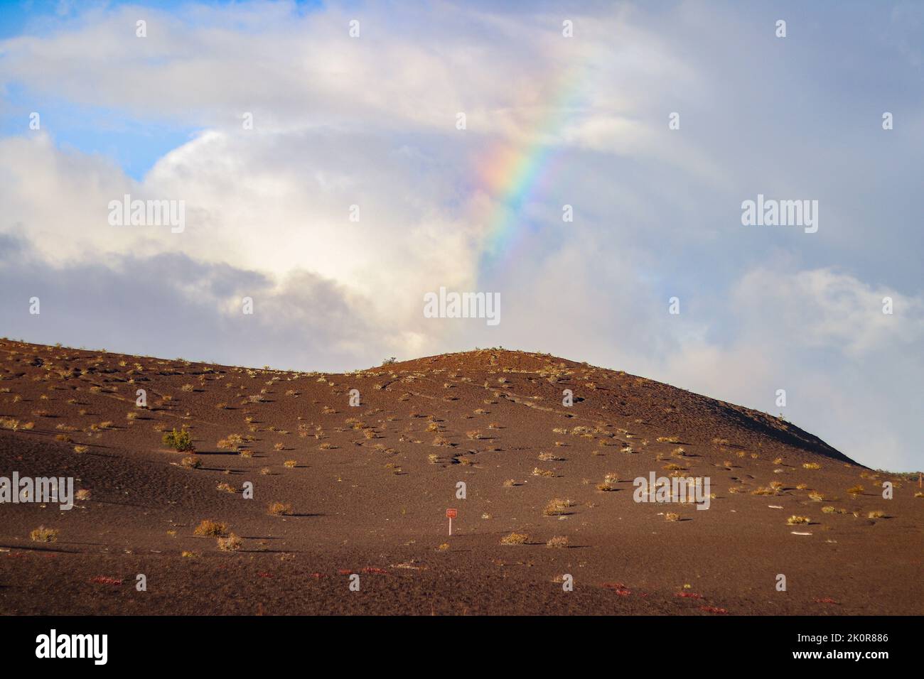A rainbow overlooking Devastation Trail at Hawaii Volcanoes National ...