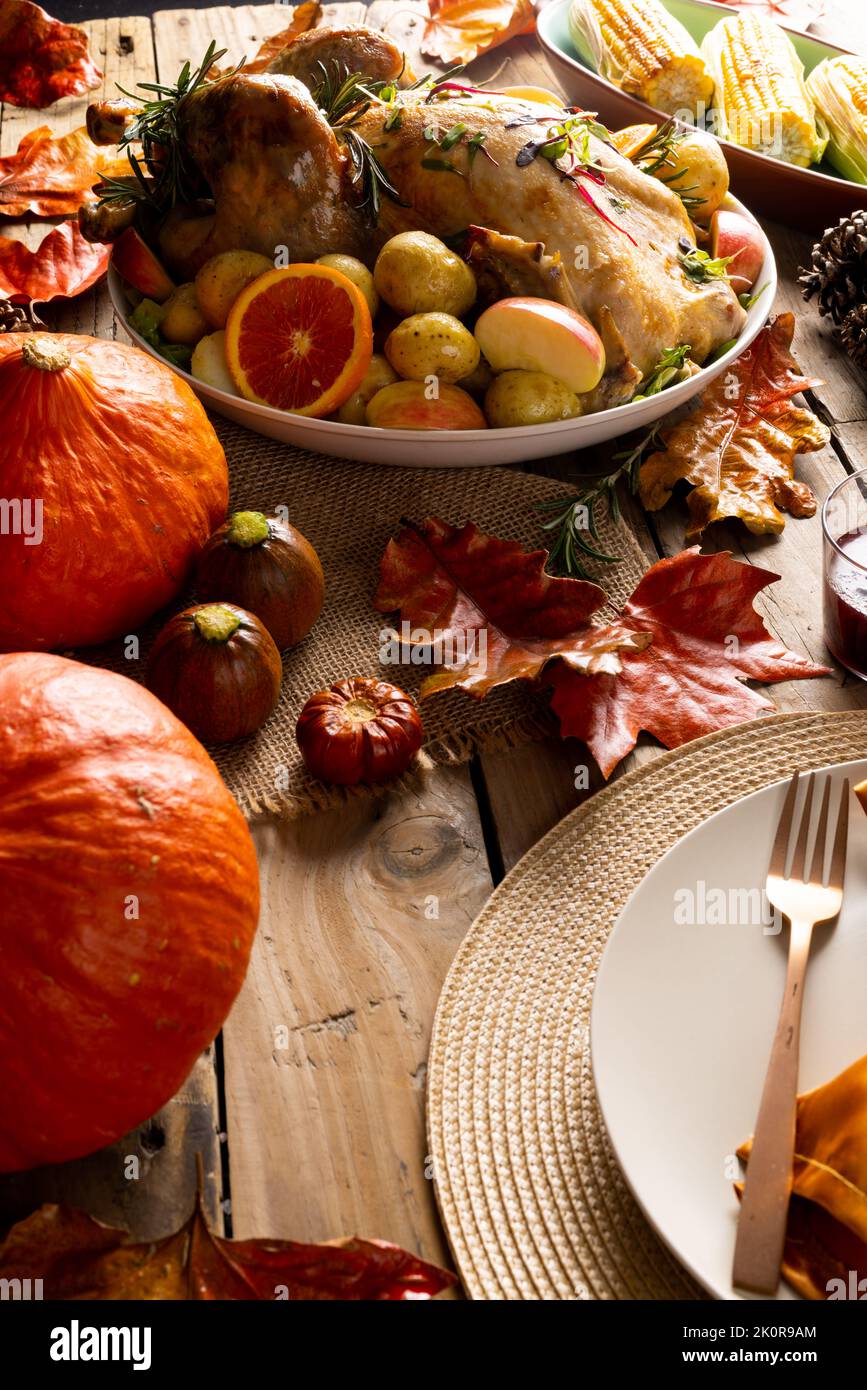 Overhead view of thanksgiving roast turkey with potatoes and autumn ...