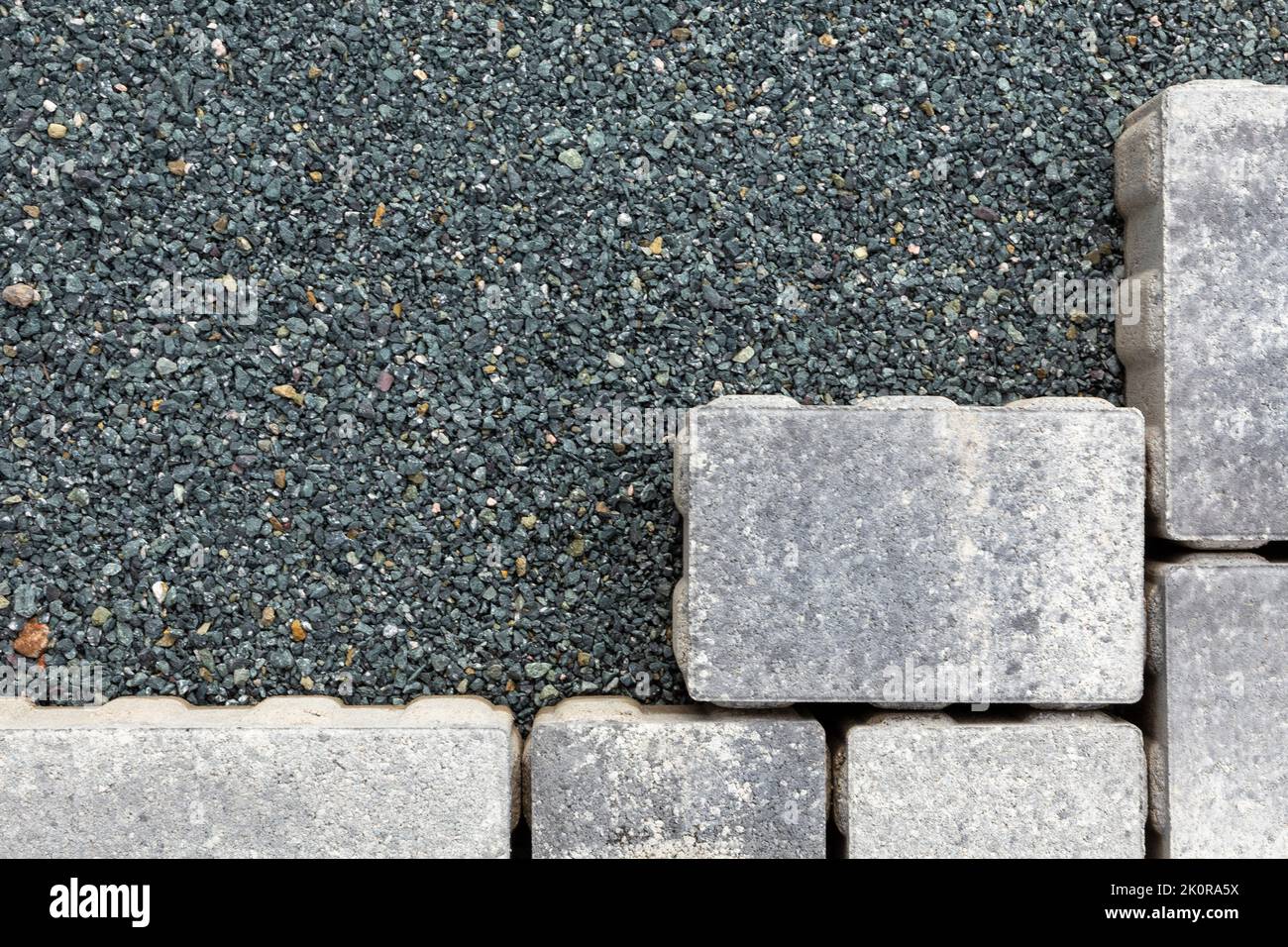 pattern of grey paving stones at a levelled chip foundation Stock Photo ...