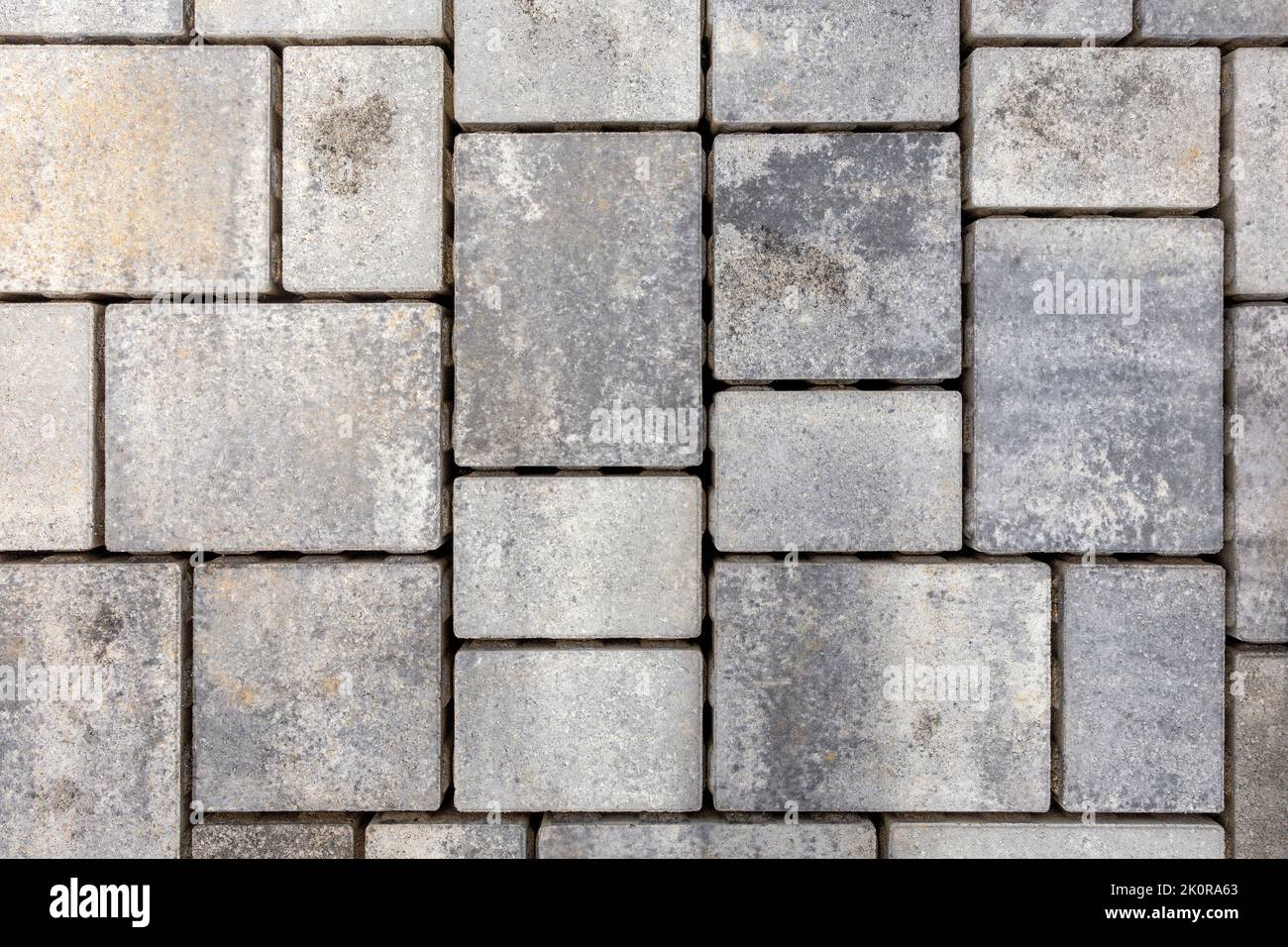harmonic pattern of grey paving stones Stock Photo - Alamy