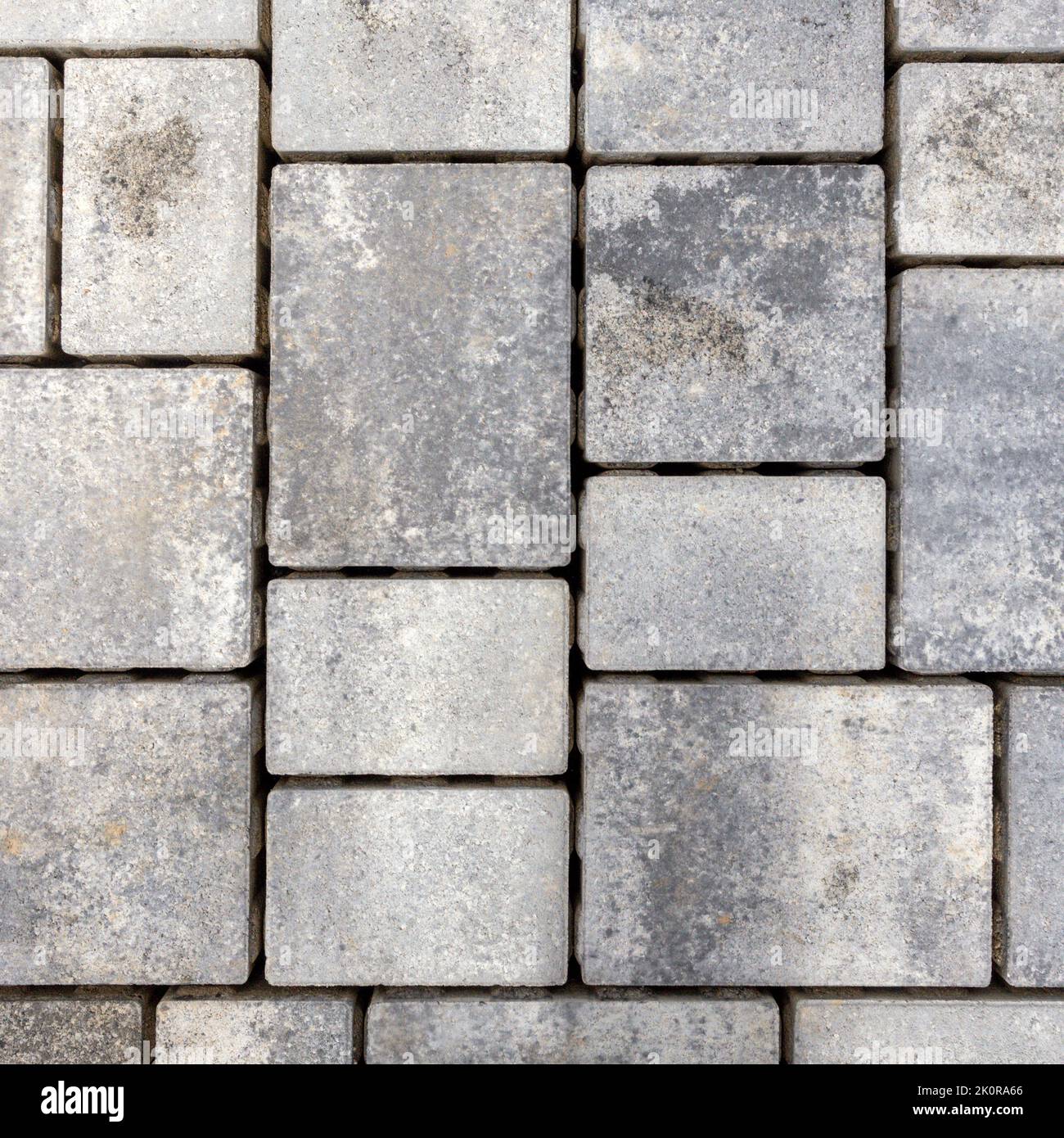 harmonic pattern of grey paving stones Stock Photo - Alamy