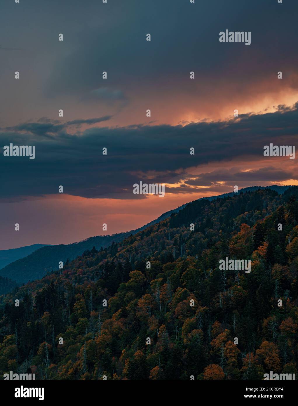 Sunset light starts to desend behind the mountains at Morton Overlook ...