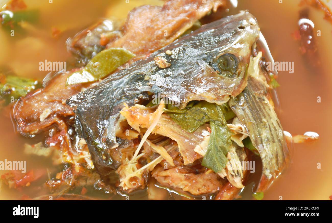 boiled smoked dry snake head fish in spicy and sour soup on bowl Stock ...