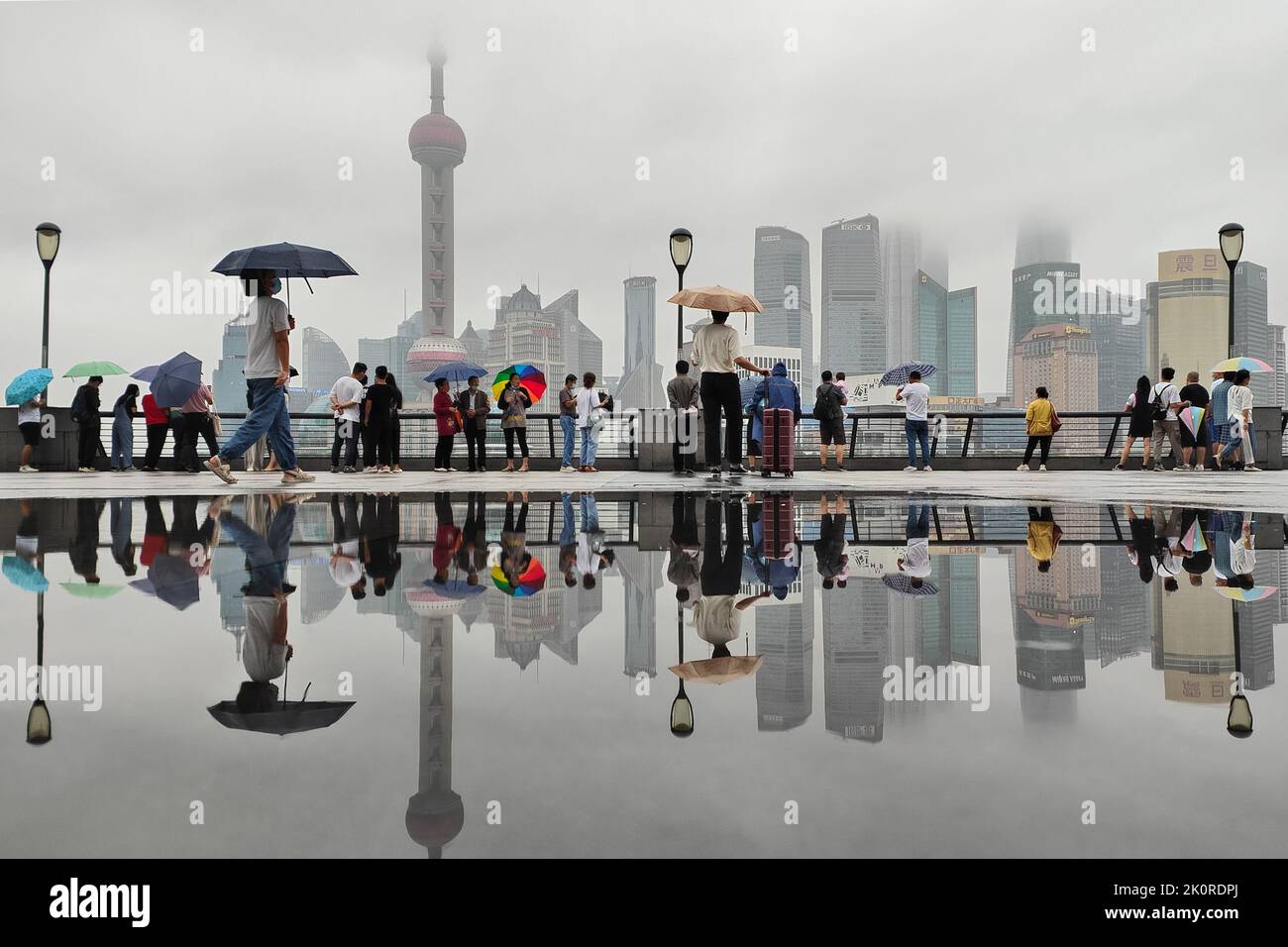 SHANGHAI, CHINA - SEPTEMBER 13, 2022 - Tourists visit the Bund on a ...