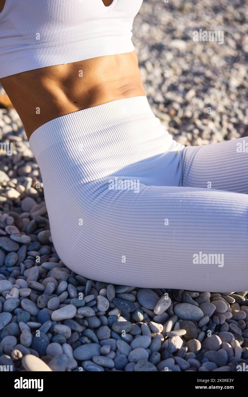 Defined abs woman hi-res stock photography and images - Alamy