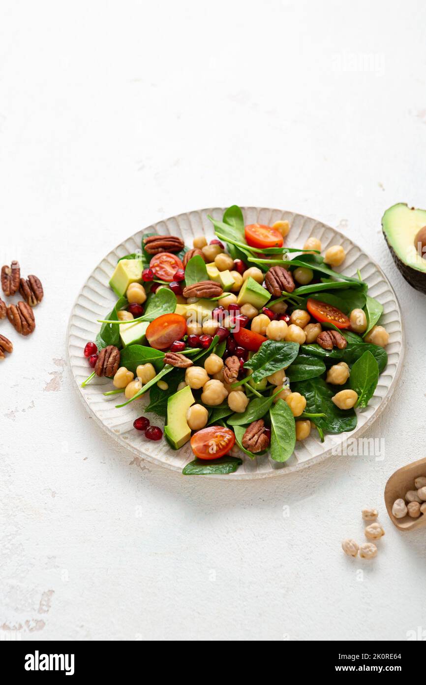 Healthy food vegan avocado salad chick pea on light surface Stock Photo ...