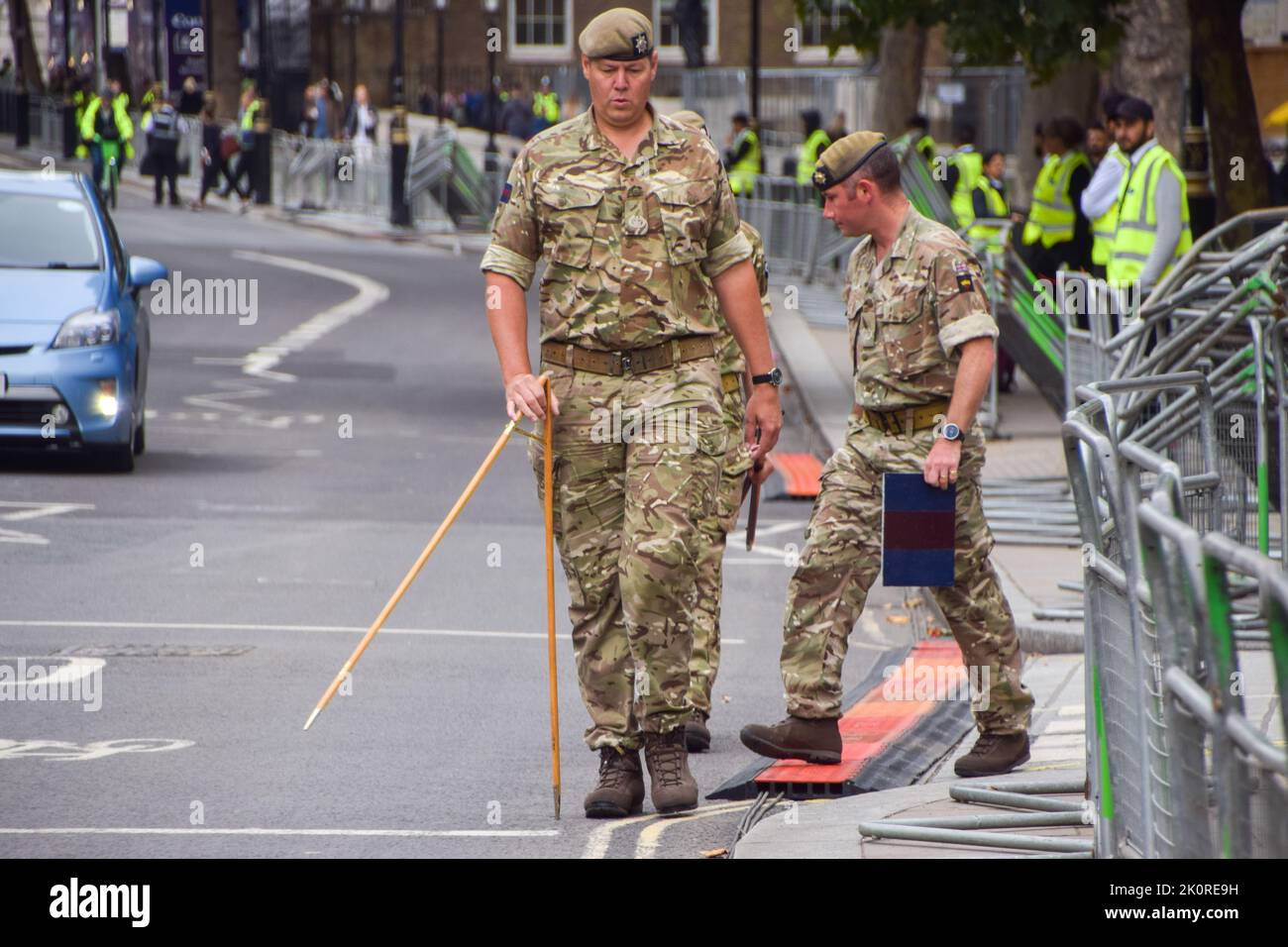 London, UK. 13th Sep, 2022. British Army personnel take measurements ...
