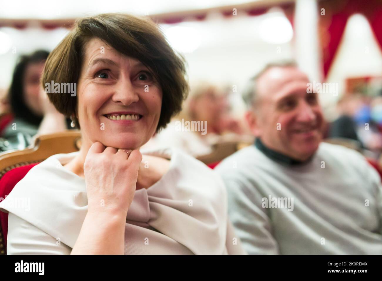 elderly couple watching play in the theater Stock Photo - Alamy