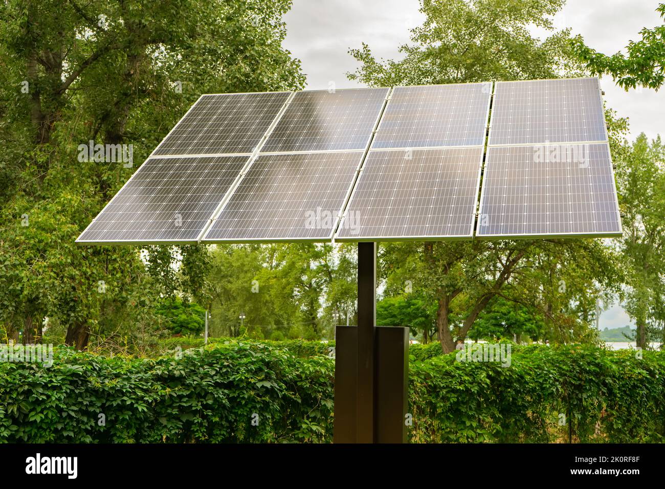 Solar panels in public park backgound. Photovoltaic modules for ...