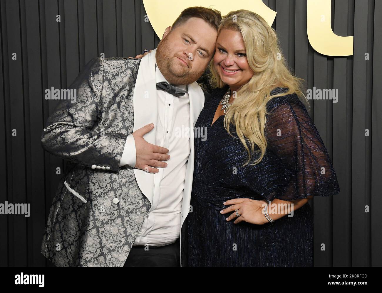 (L-R) Paul Walter Hauser and Wife Amy Hauser arrives at the Apple TV+ ...