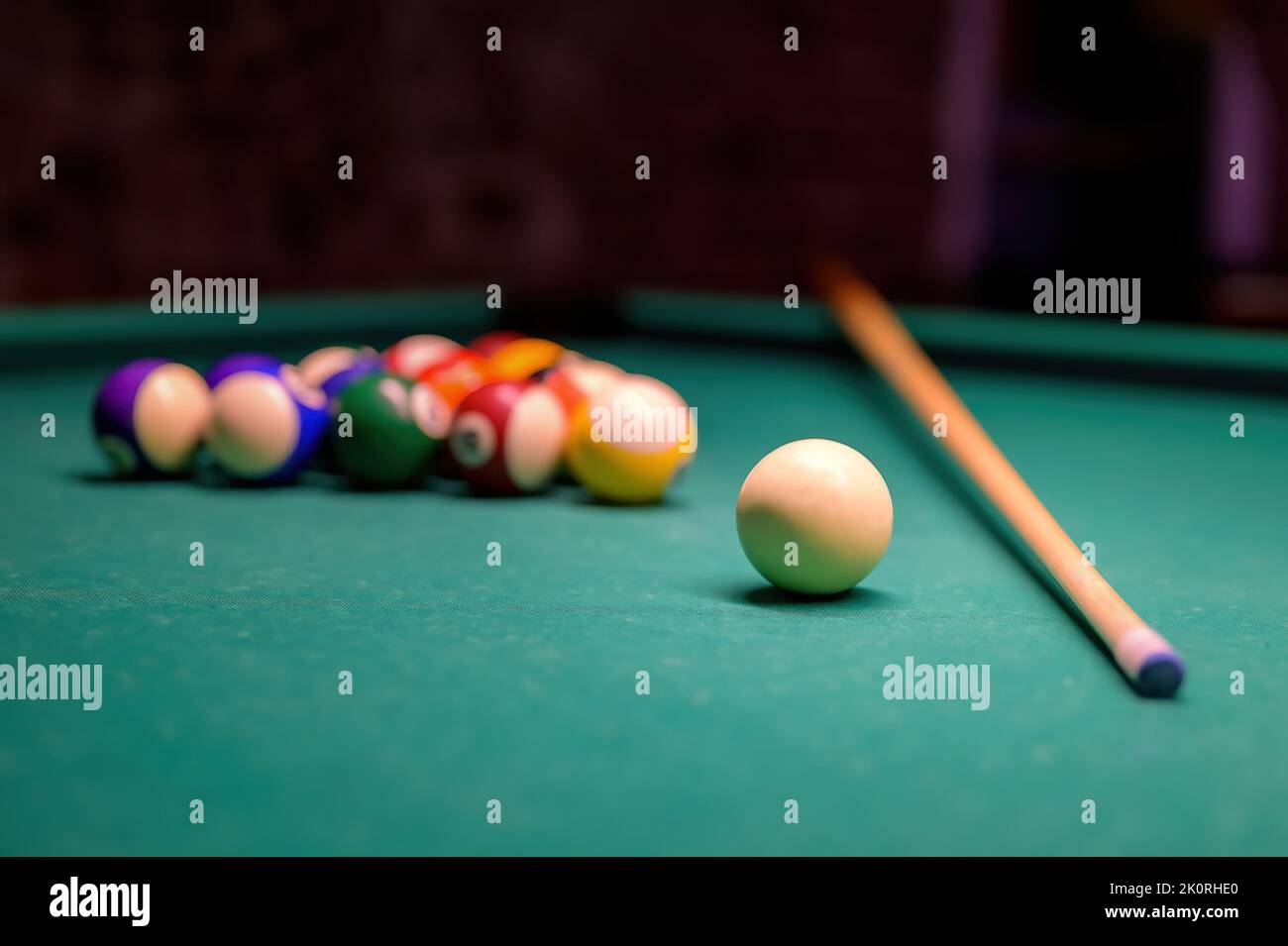 Billiard pool game, colored balls with cue stick and cue ball set on ...