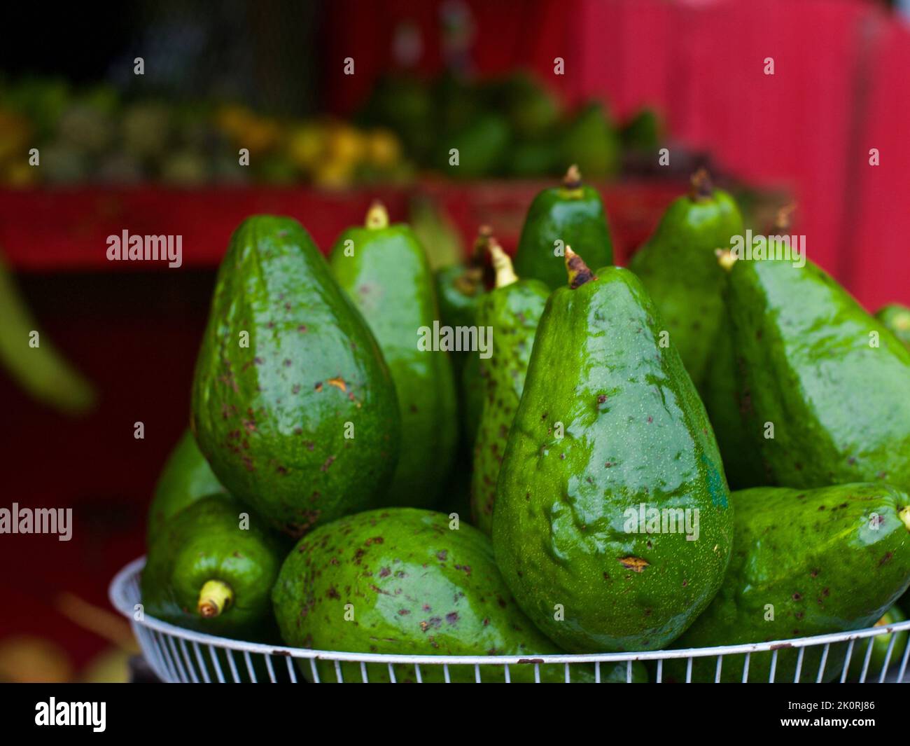 Fresh tropical fruit in market stall Stock Photo - Alamy