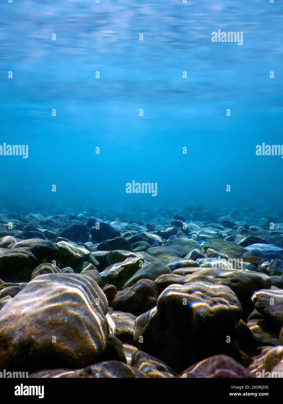 Underwater pebbles below water surface, Rocks and Pebbles Stock Photo ...