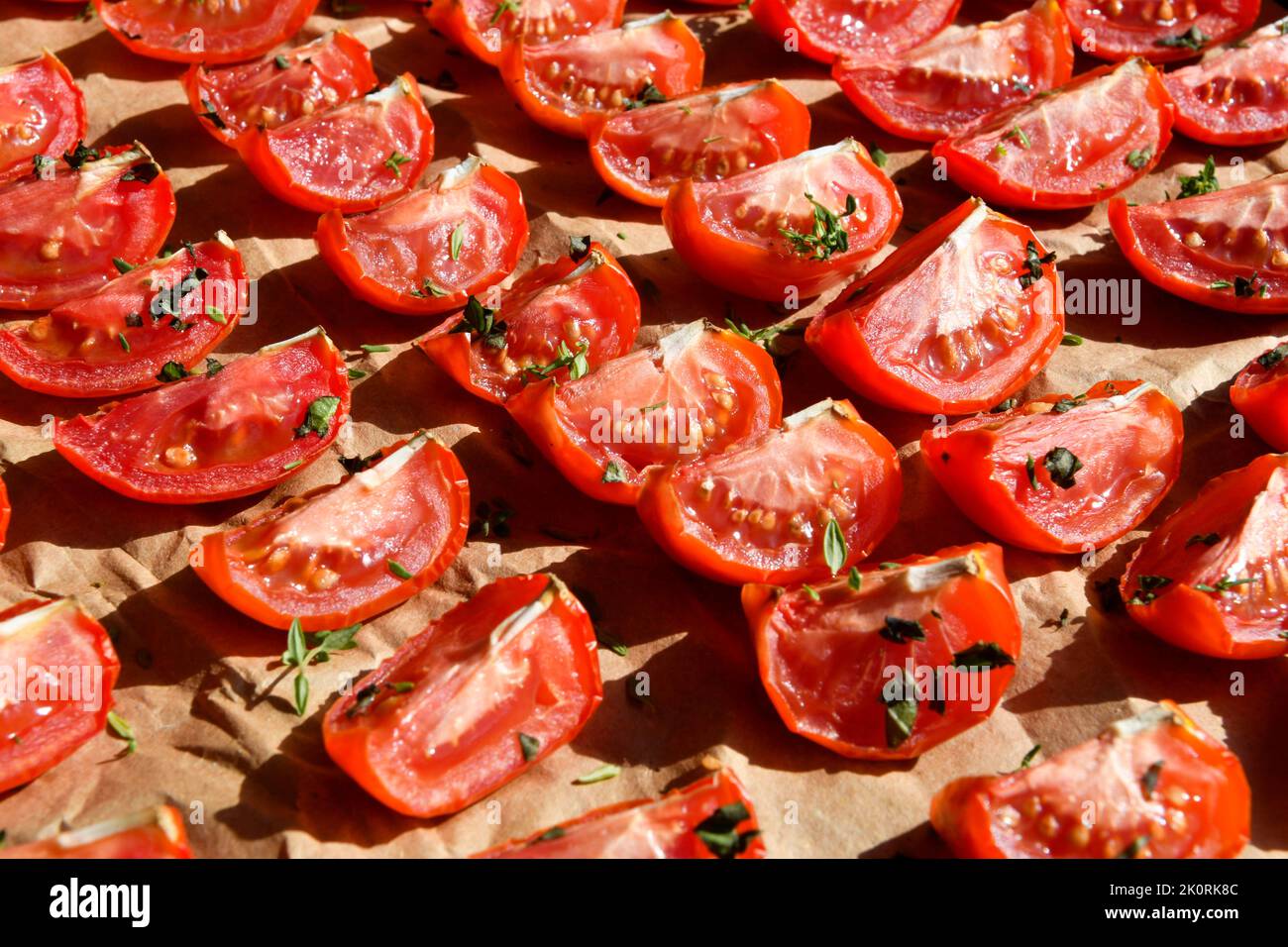 sun-dried tomatoes on paper Stock Photo - Alamy