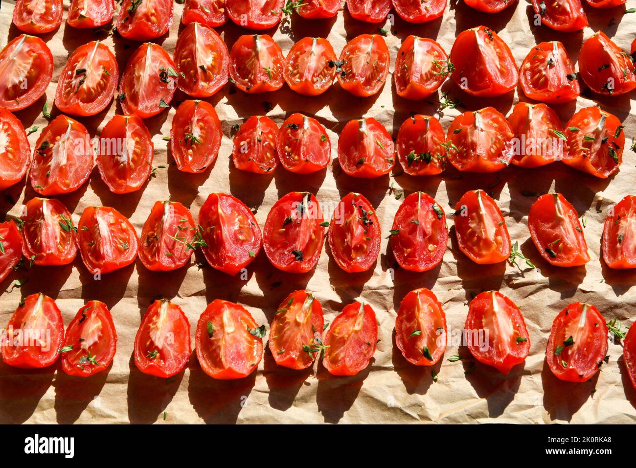 sun-dried tomatoes on paper Stock Photo - Alamy