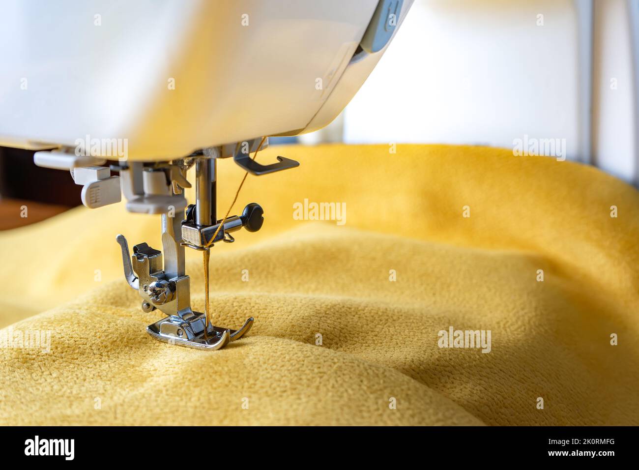 Modern Sewing Machine Presser Foot With Linen Fabric And Thread Closeup Copy Space Sewing